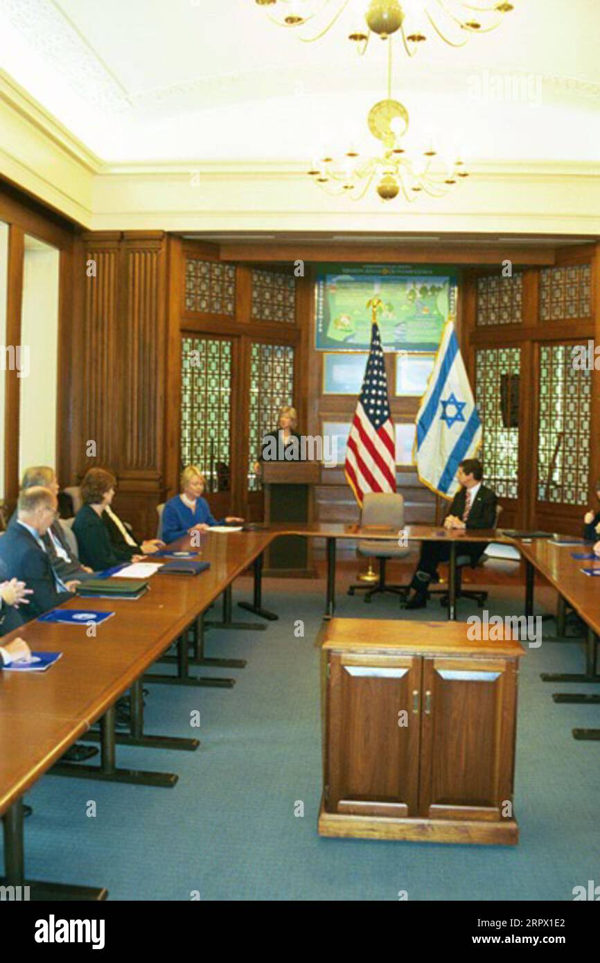Secretary Gale Norton speaking at podium, with Israel's Ambassador to ...
