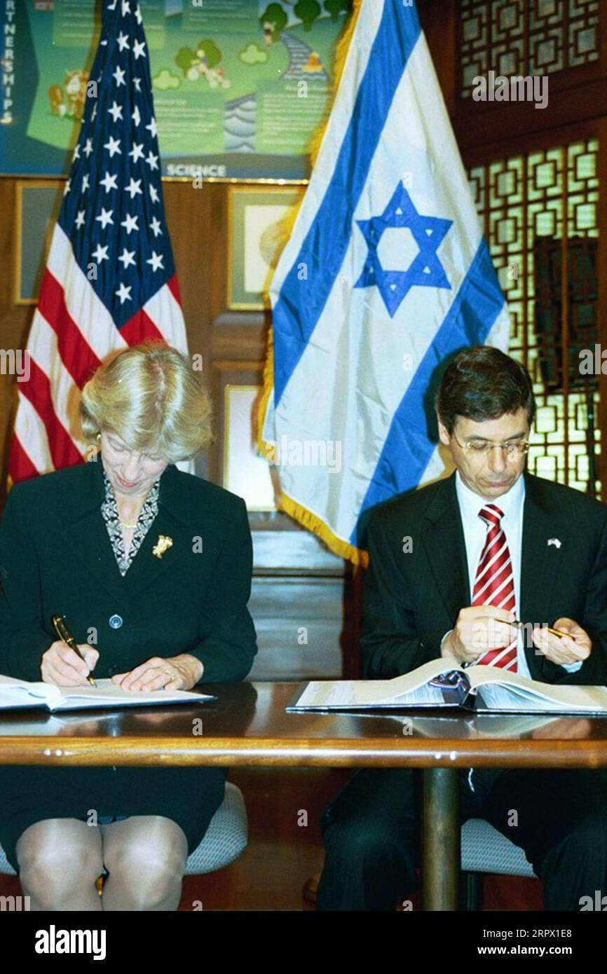 Secretary Gale Norton, seated left, and Israel's Ambassador to the U.S ...