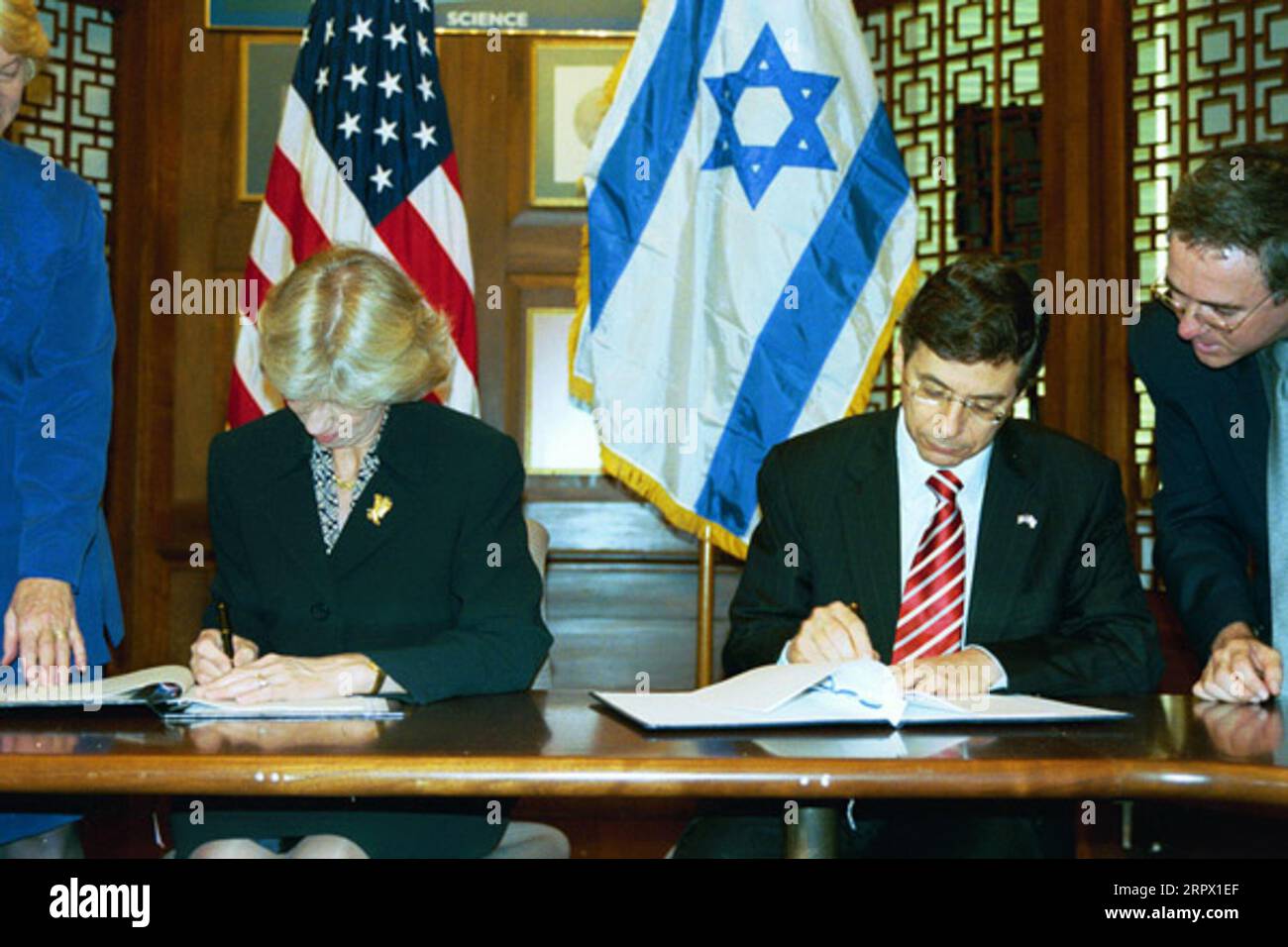 Secretary Gale Norton, seated left, and Israel's Ambassador to the U.S ...