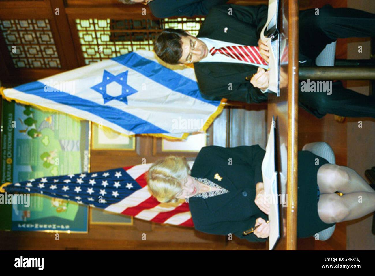 Secretary Gale Norton, seated left, and Israel's Ambassador to the U.S ...