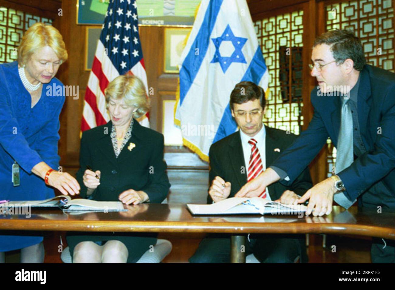 Secretary Gale Norton, seated left, and Israel's Ambassador to the U.S ...