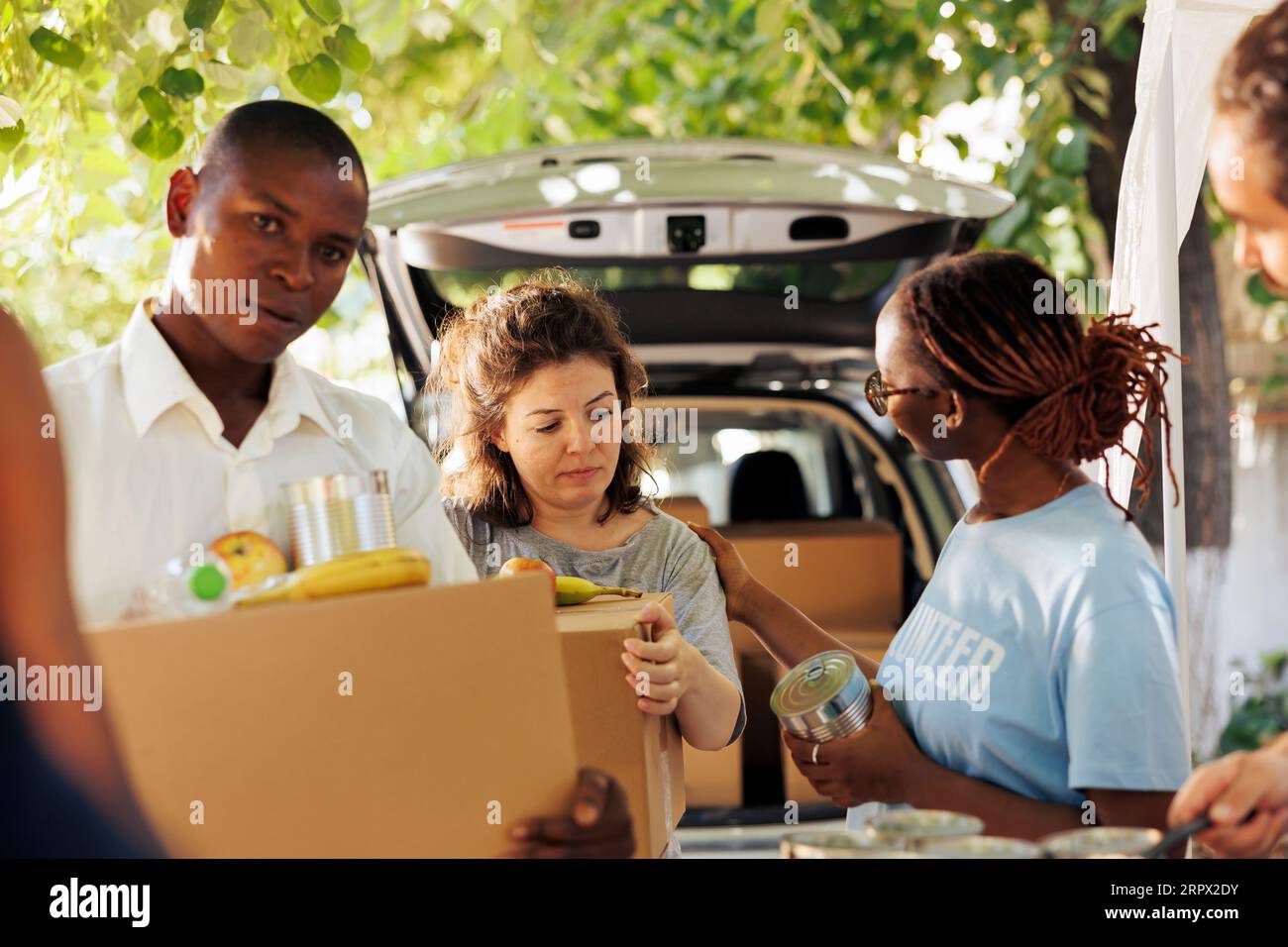 Empathy in action, as humanitarian aid team assists the poor by ...