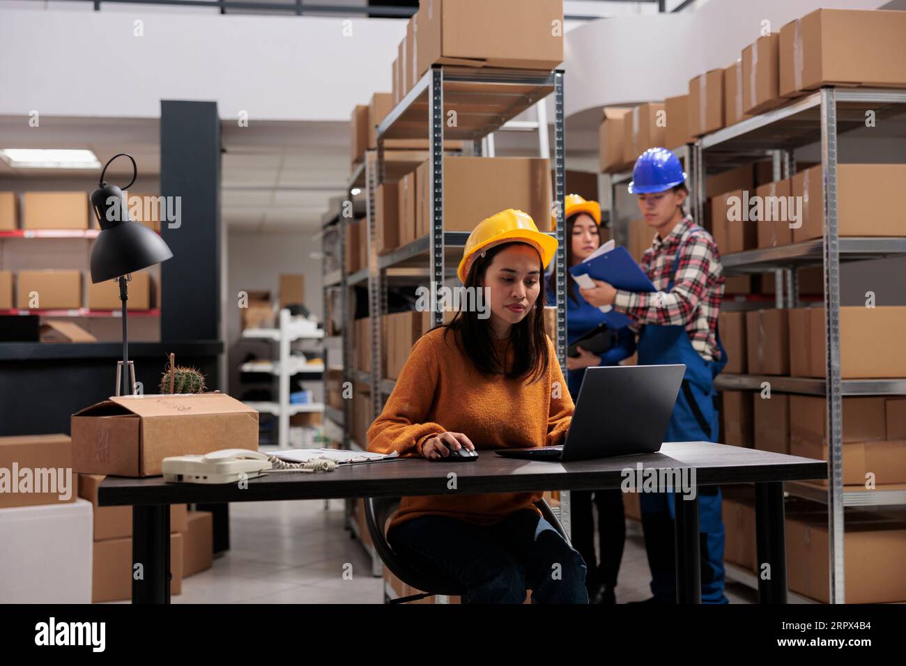 Shipment service worker checking warehouse products management system ...