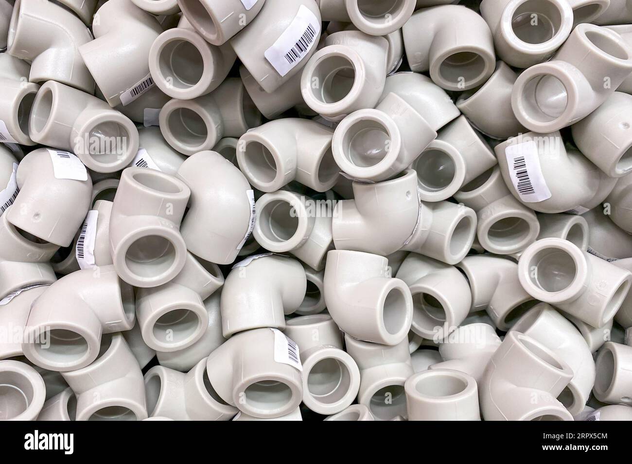 Gray pvc plumbing pipes corners. Warehouse of polypropylene pipes. line ...