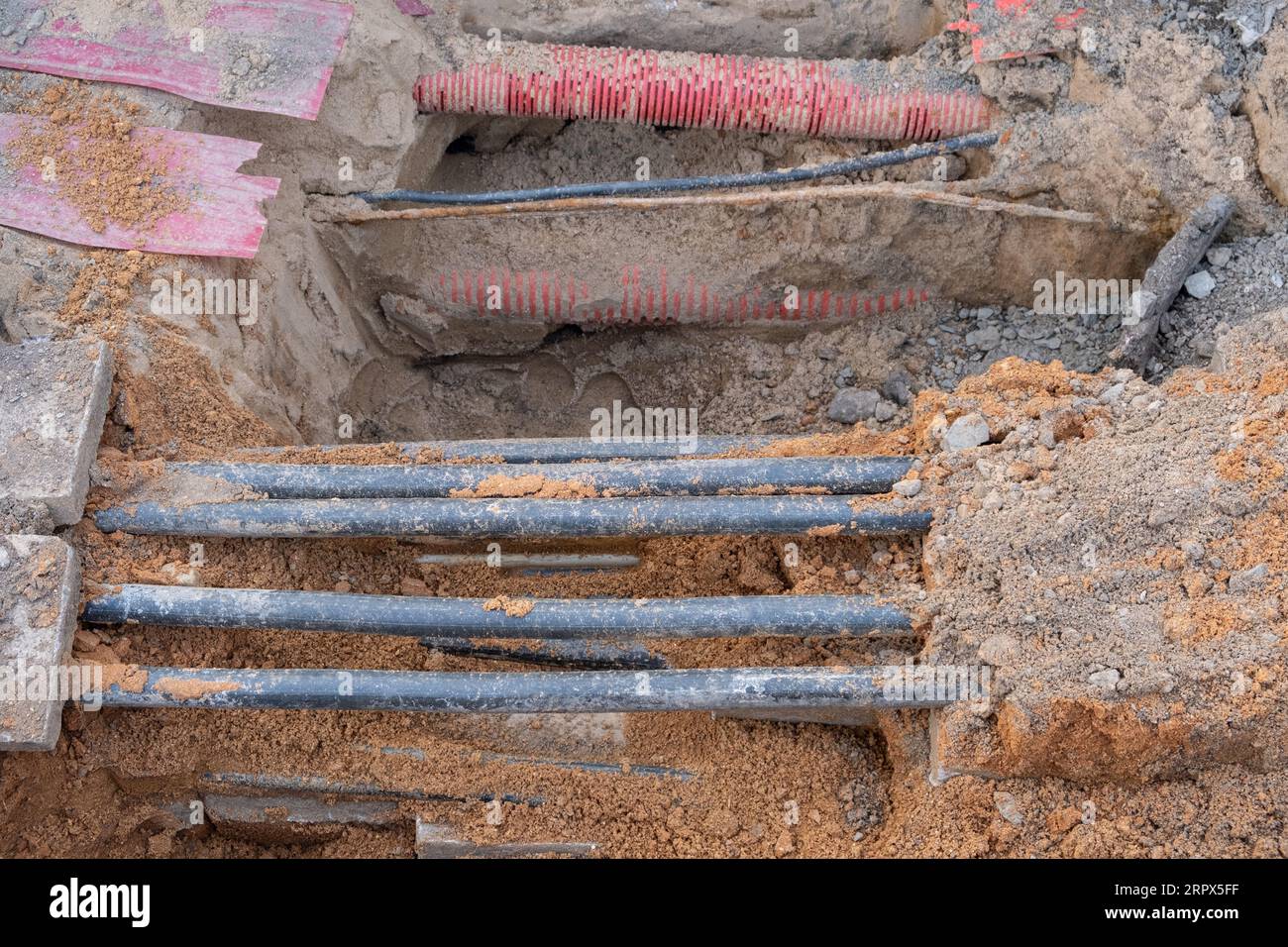 underground electric cable infrastructure installation. Construction ...