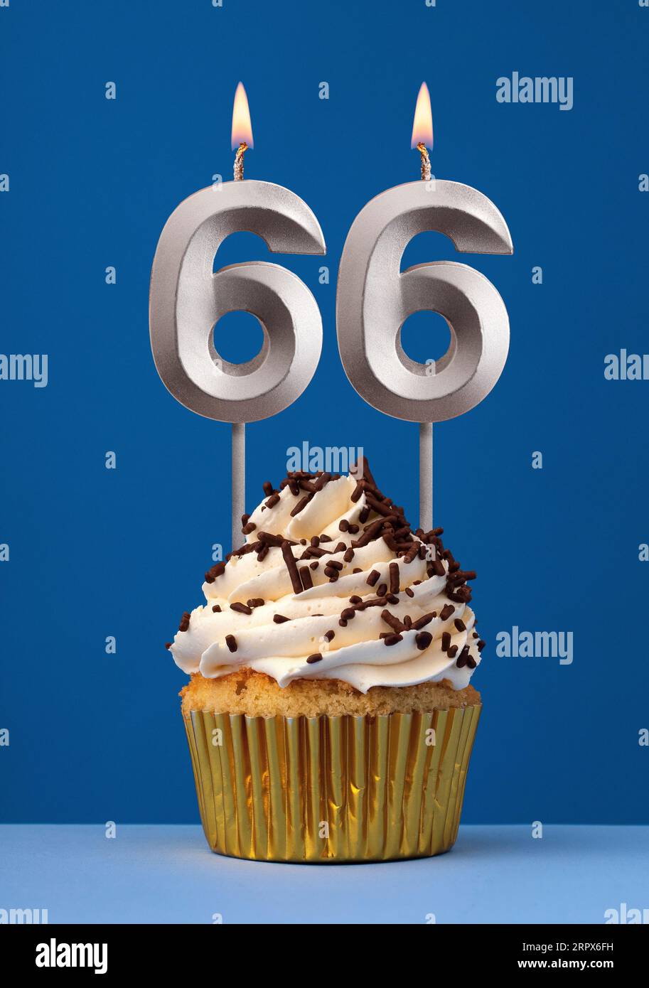 Vertical birthday card with cake - Lit candle number 66 on blue ...