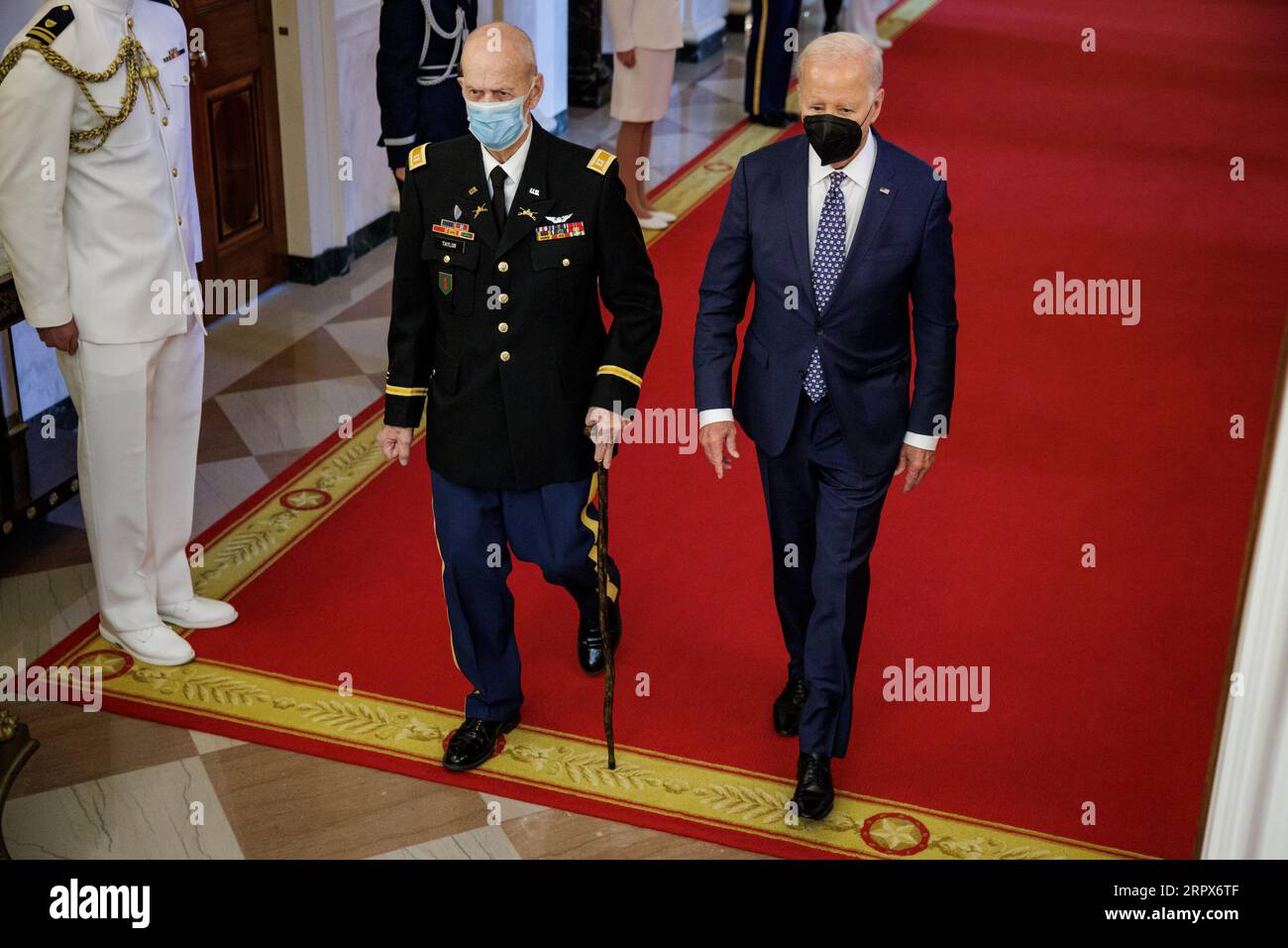 United States President Joe Biden and U.S. Army Captain Larry Taylor ...