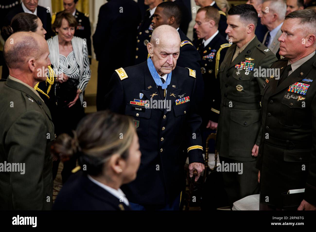 United States Army Captain Larry Taylor leaves the East Room after ...