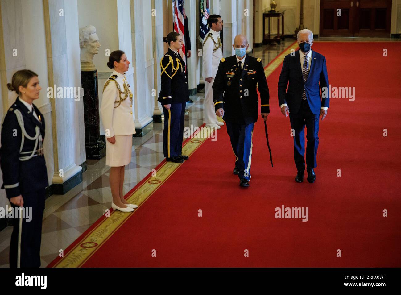United States President Joe Biden and U.S. Army Captain Larry Taylor ...