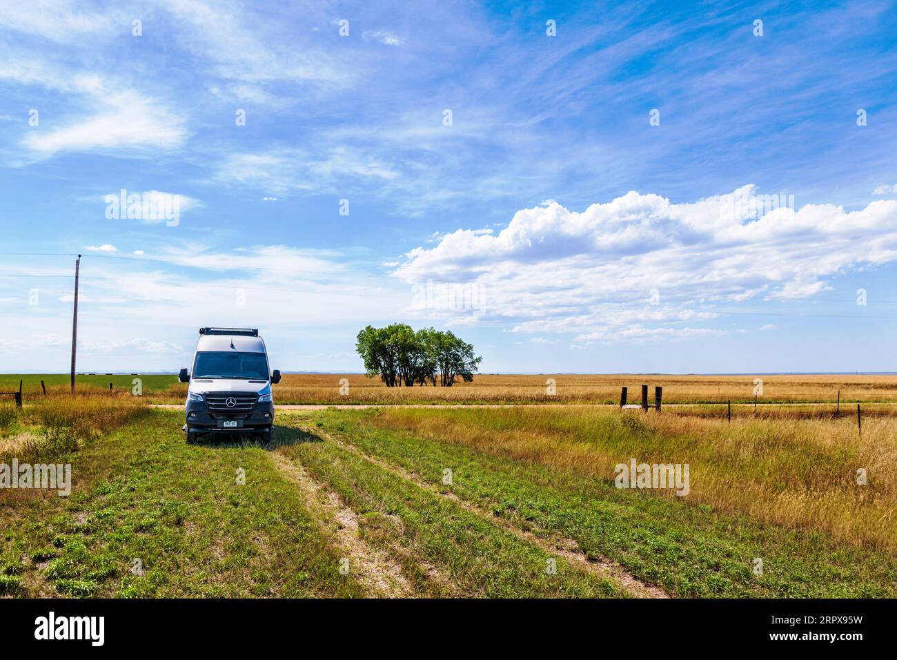 Airstream Interstate 24X 4WD campervan; rural ranch road; Badlands ...