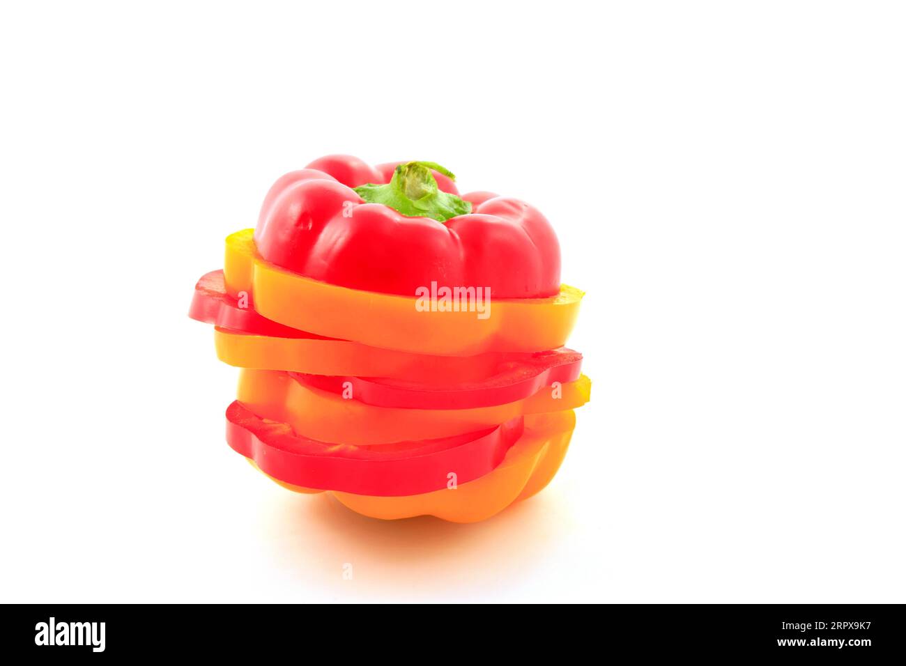 chopped color pepper on white background Stock Photo - Alamy