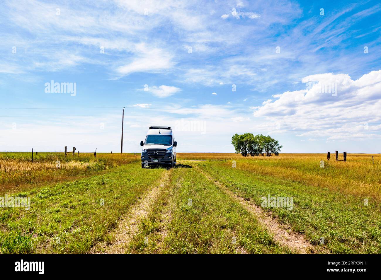 Airstream Interstate 24X 4WD campervan; rural ranch road; Badlands ...