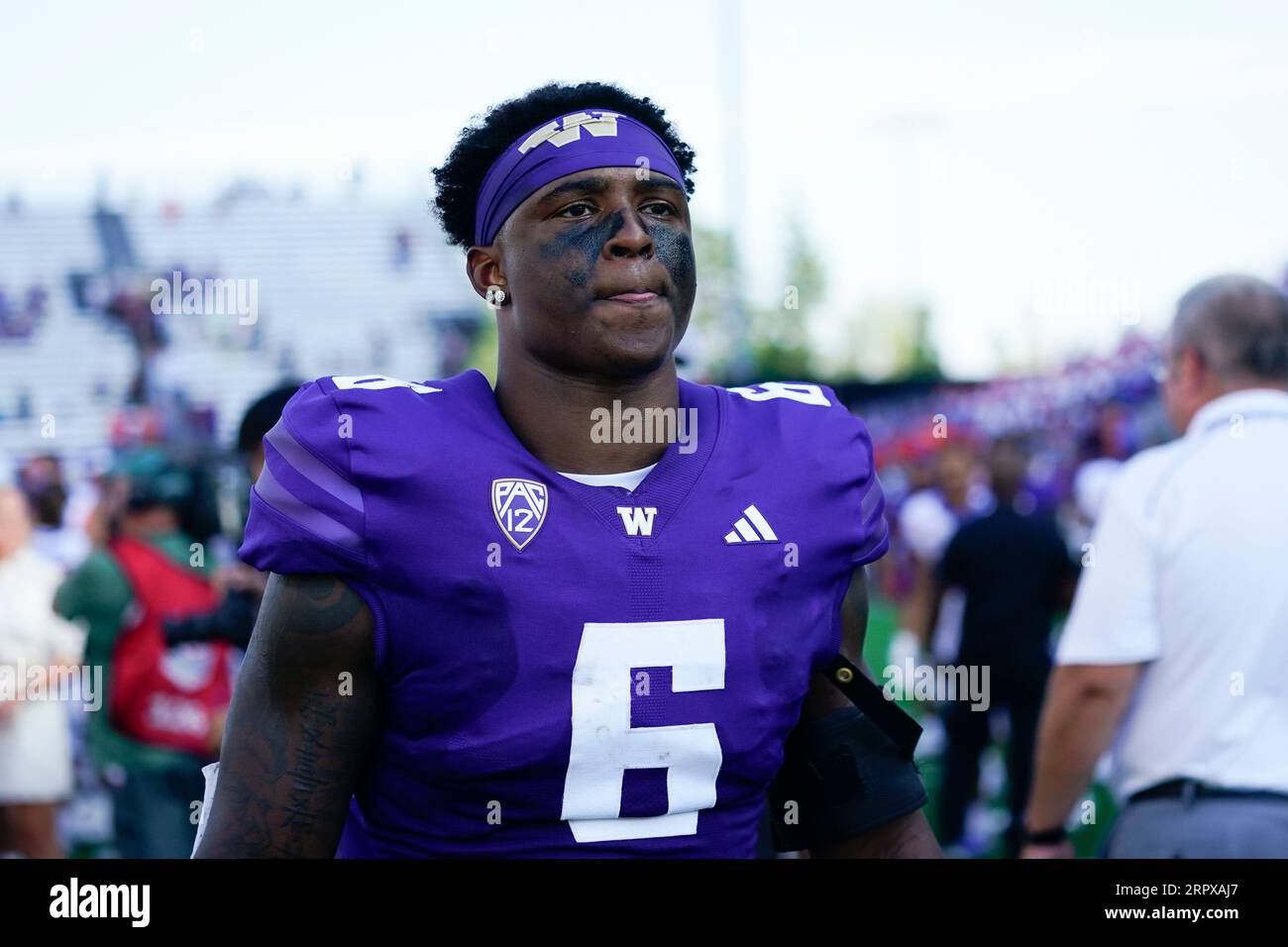 Washington running back Richard Newton walks on the field following a ...