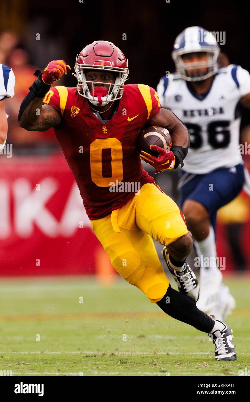 USC Trojans wide receiver Kyron Hudson (10) runs after the catch during ...