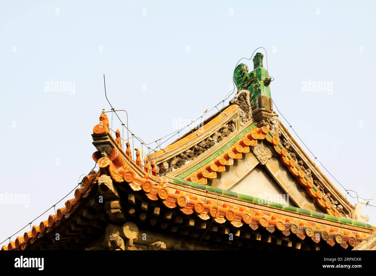 Temple eaves and beast sculpture, closeup of photo Stock Photo - Alamy