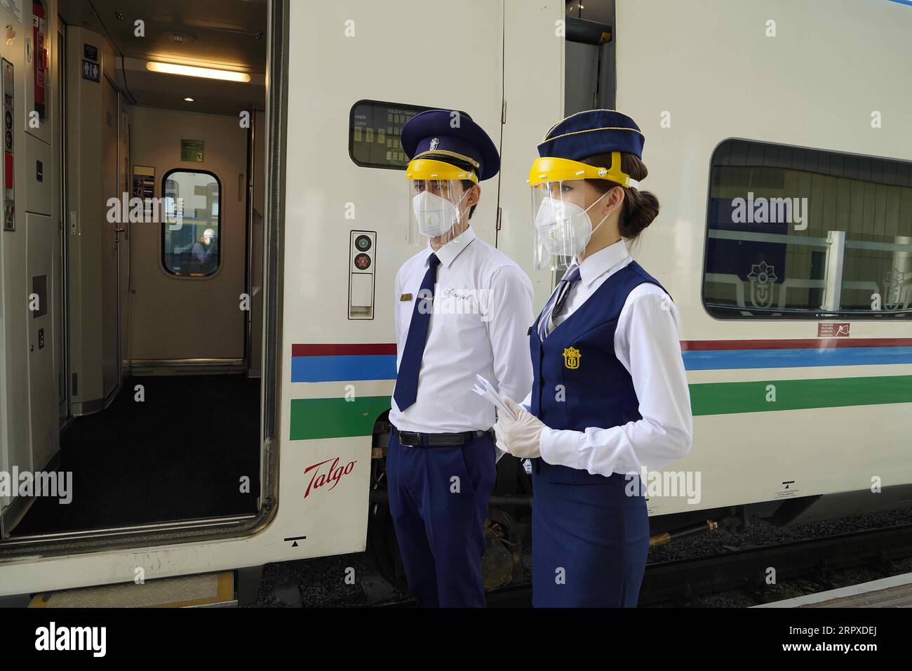 Uzbekistan train attendants hi-res stock photography and images - Alamy