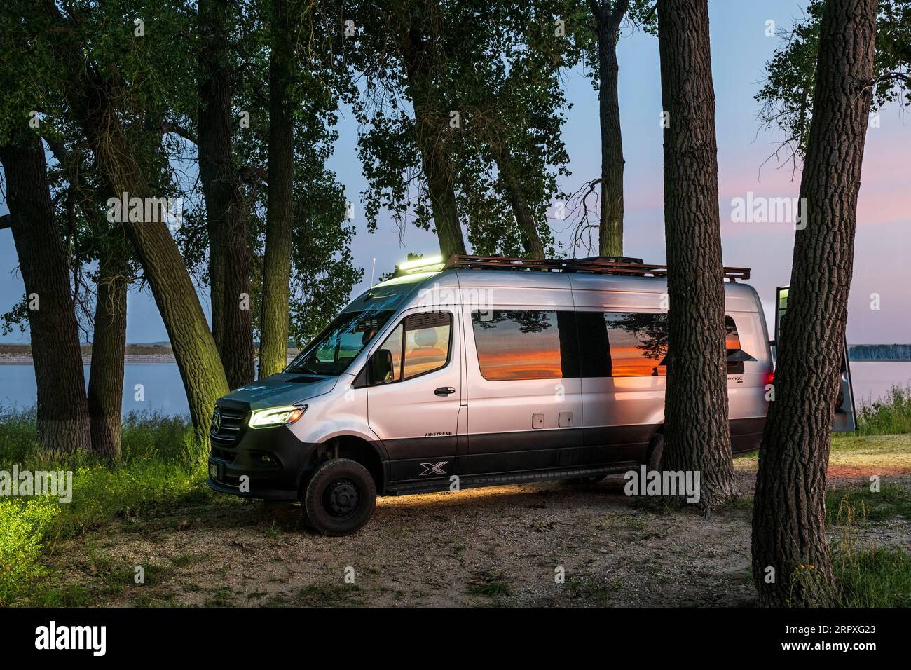 Dusk sunset view of Airstream Interstate 24X 4WD campervan; Box Butte ...