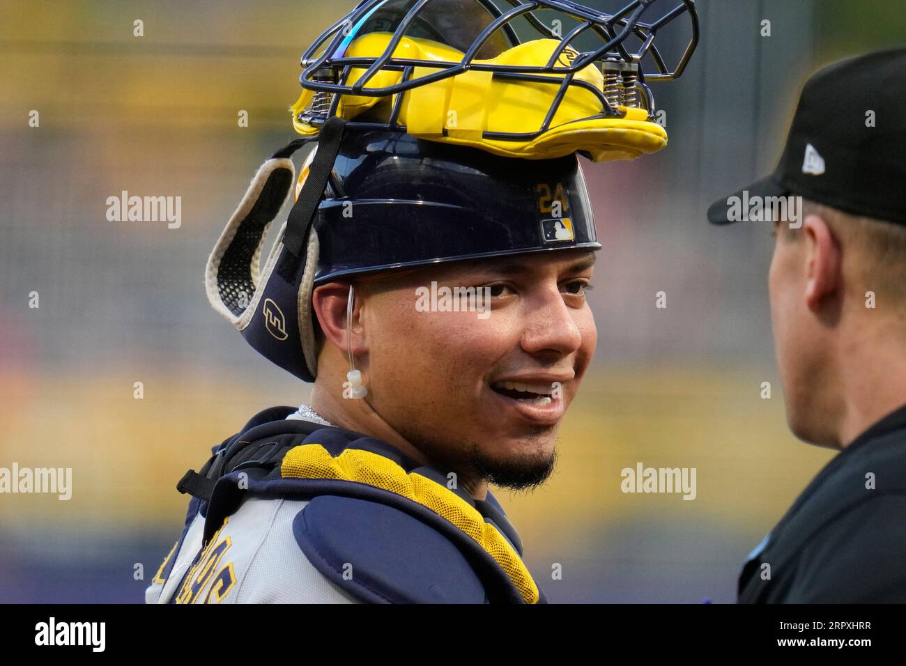 Milwaukee Brewers catcher William Contreras, left, talks with umpire ...