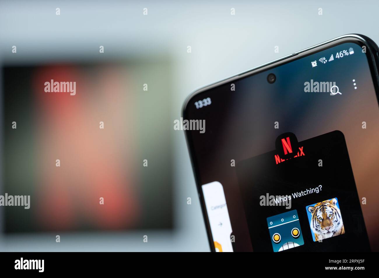 New York, USA - August 20, 2023: Managing Netflix app on smartphone ...