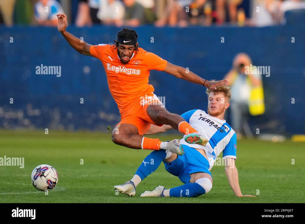 Luca Stephenson #18 of Barrow fouls Dominic Thompson #23 of Blackpool ...