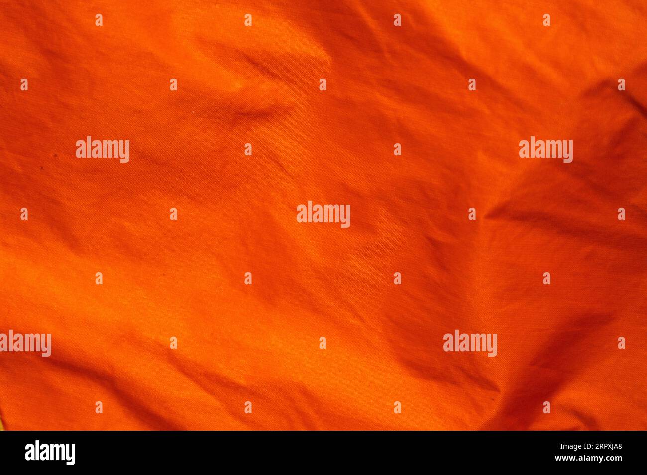 metallic orange crumpled fabric texture Stock Photo - Alamy