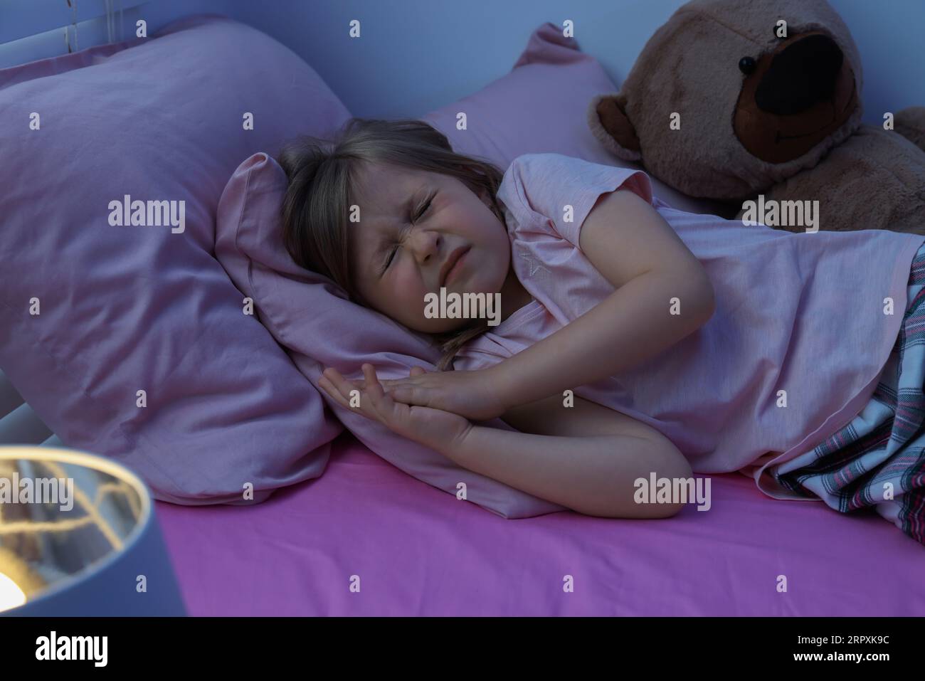 Little girl snoring while sleeping in bed at home Stock Photo - Alamy