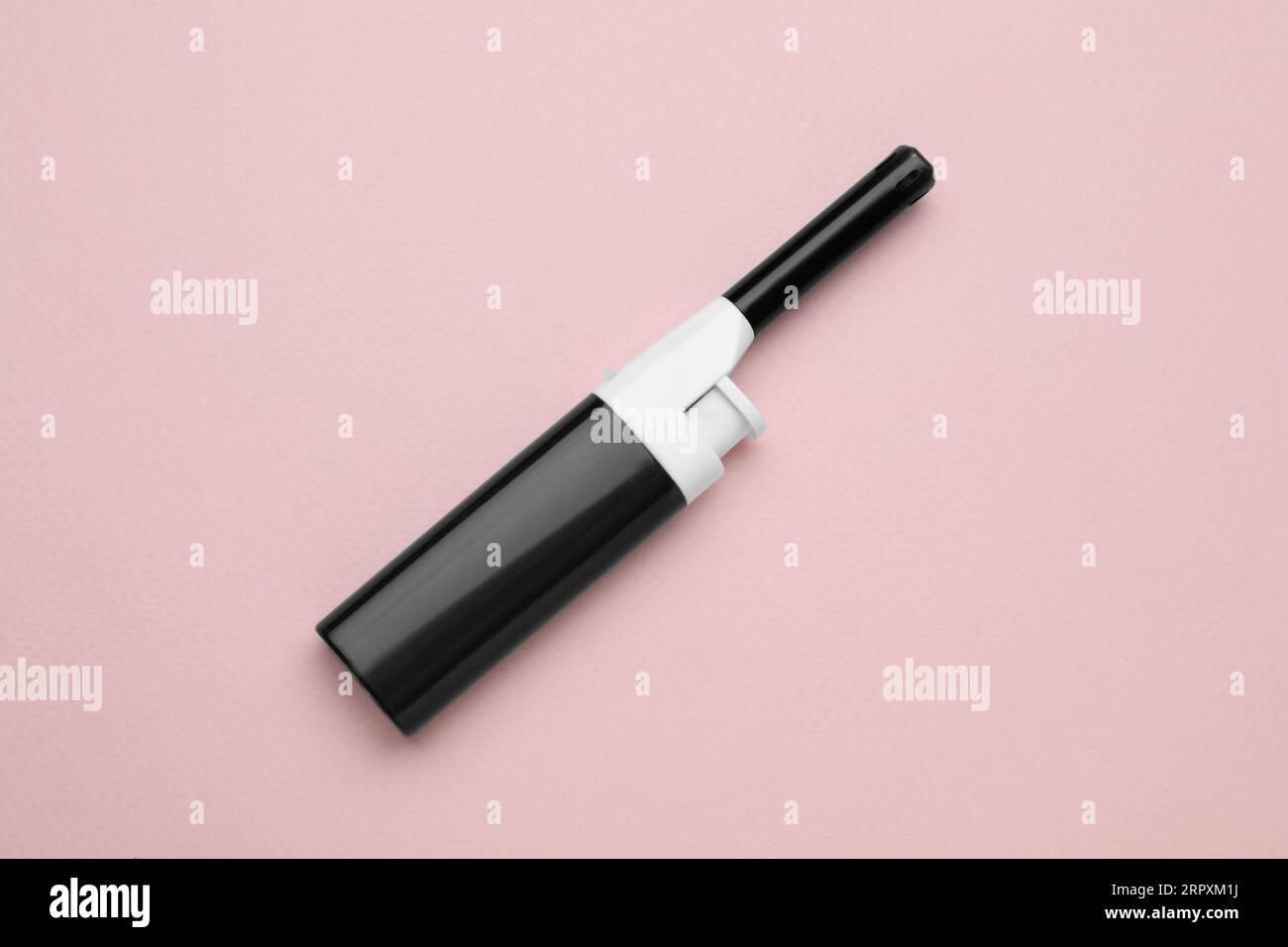 One gas lighter on beige background, top view Stock Photo - Alamy