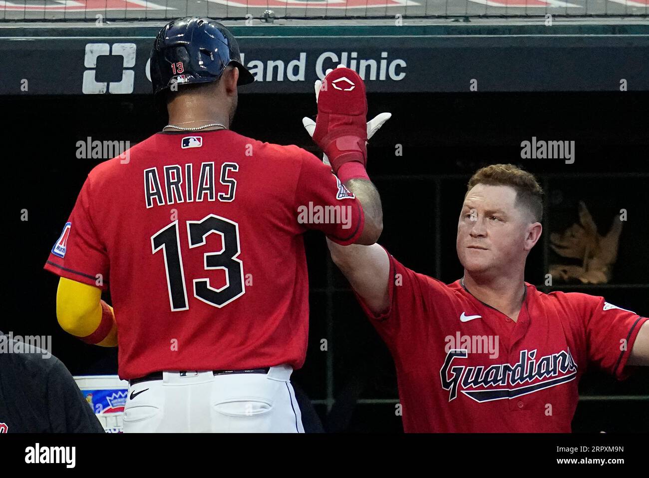 Cleveland Guardians' Gabriel Arias (13) gets a high five from teammate ...