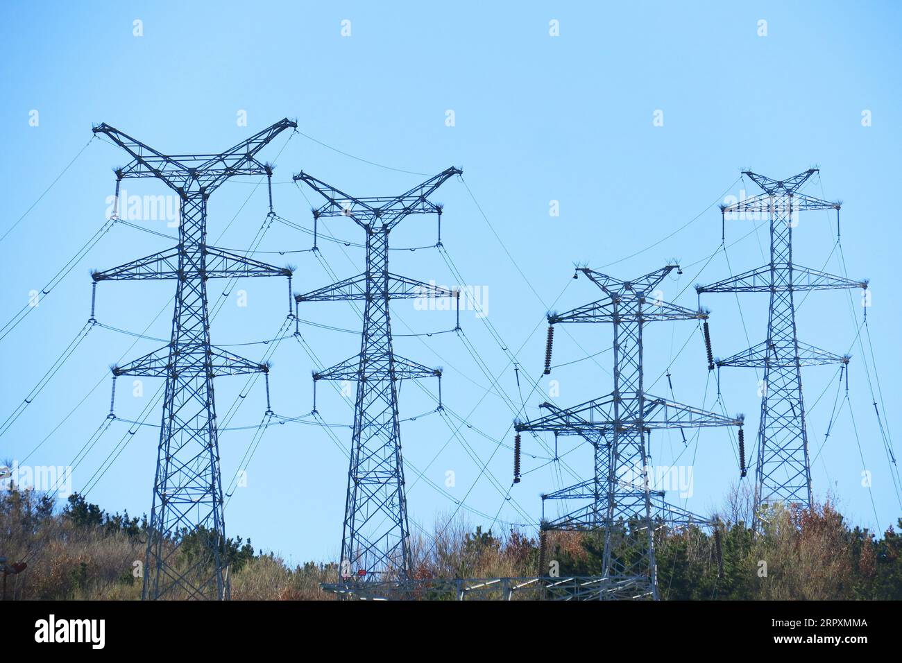 YANTAI, CHINA - APRIL 7, 2023 - A high-voltage transmission grid is ...