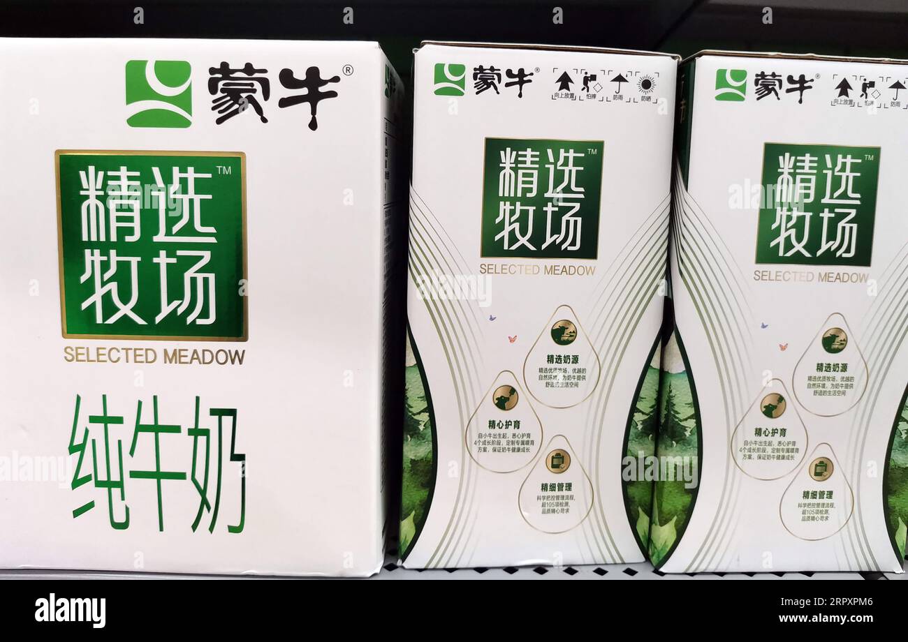 Mengniu dairy products on sale at a supermarket in Yichang, Hubei ...