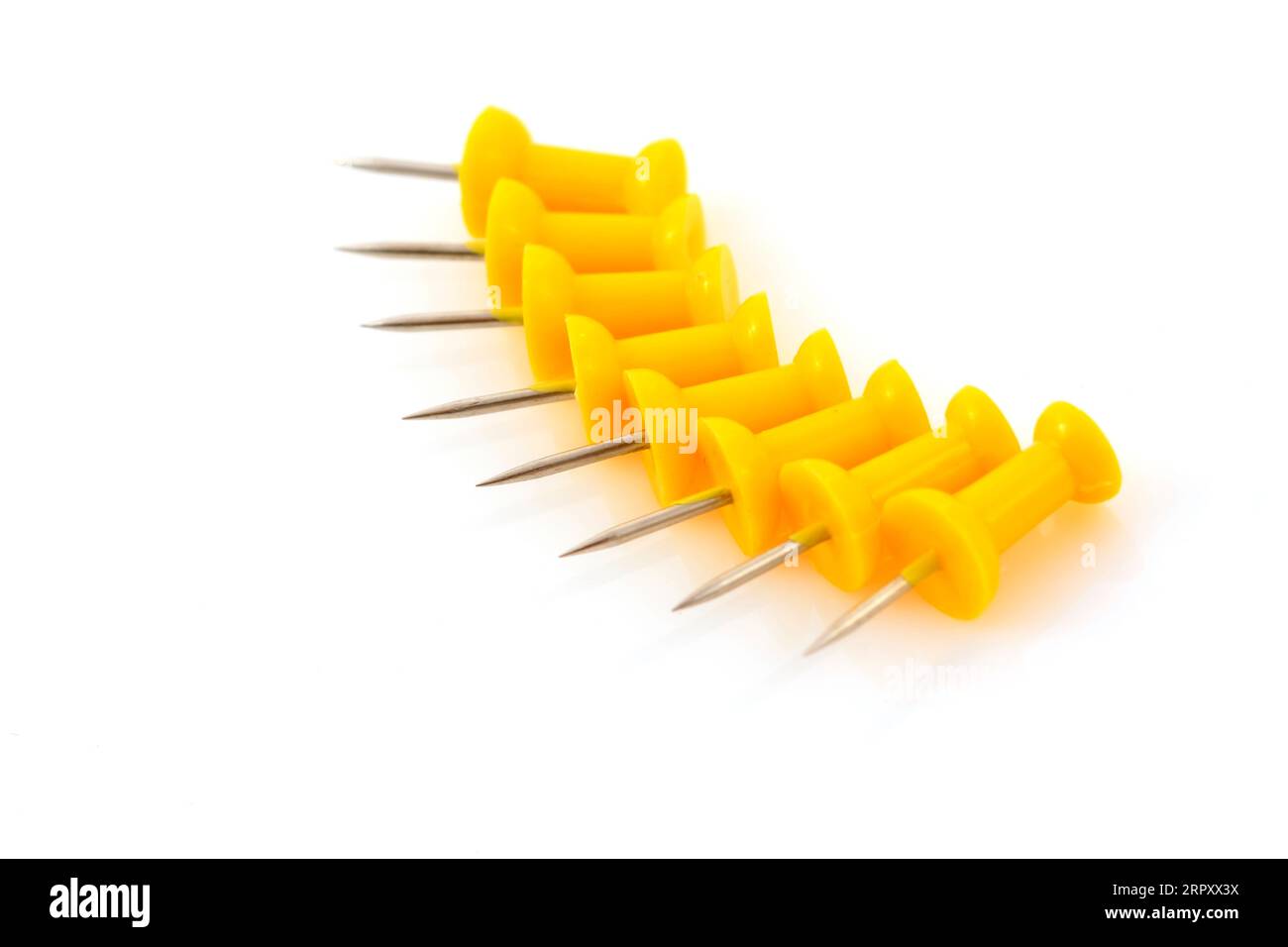 color drawing pin on white background Stock Photo - Alamy