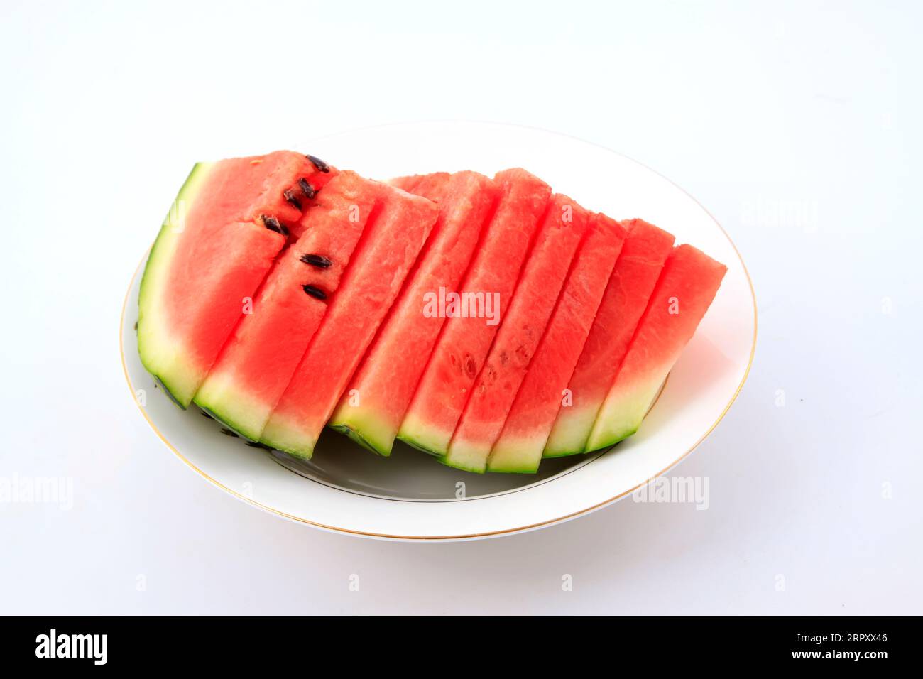 Watermelon slices in a ceramic plate, closeup of photo Stock Photo - Alamy