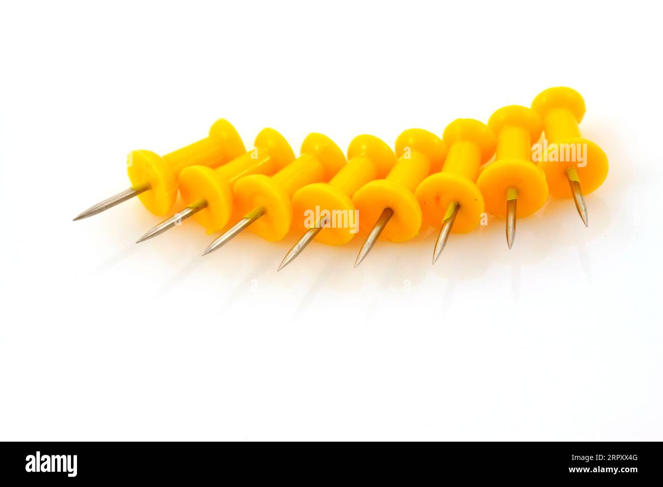 color drawing pin on white background Stock Photo - Alamy