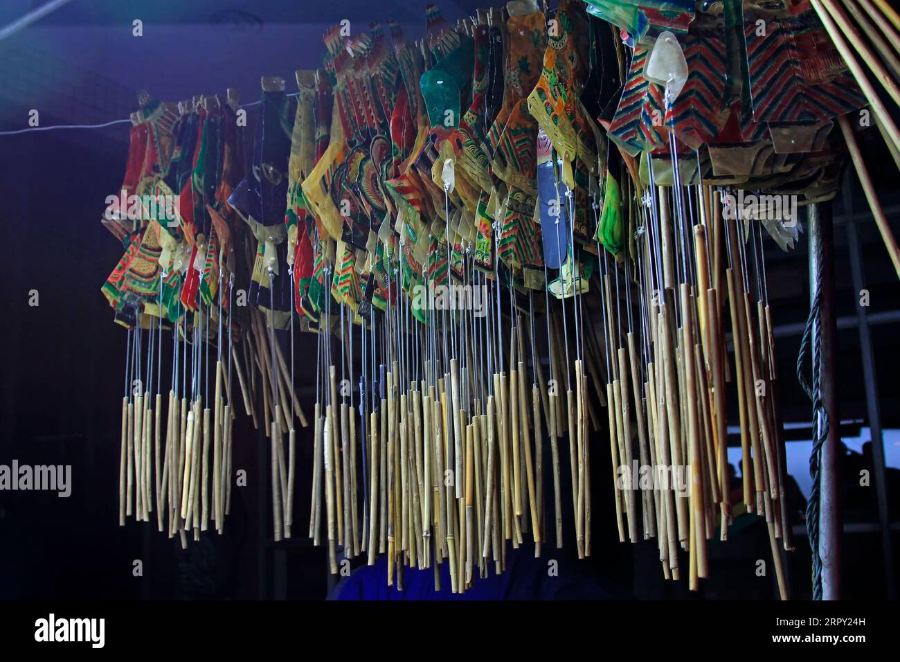 Chinese shadow play props hanging in the night, closeup of photo Stock ...