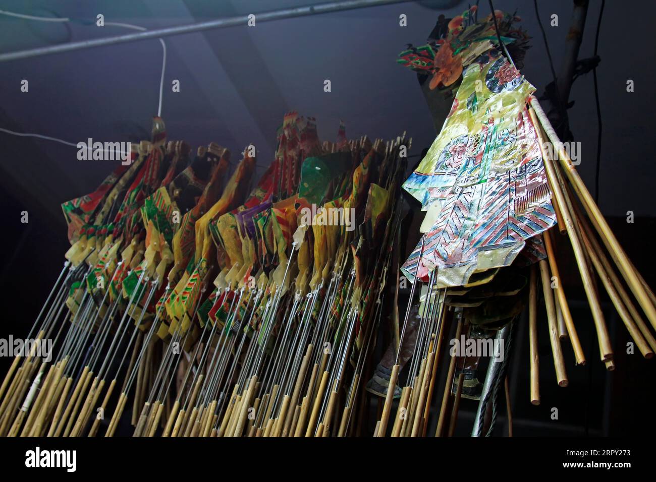 Chinese shadow play props hanging in the night, closeup of photo Stock ...