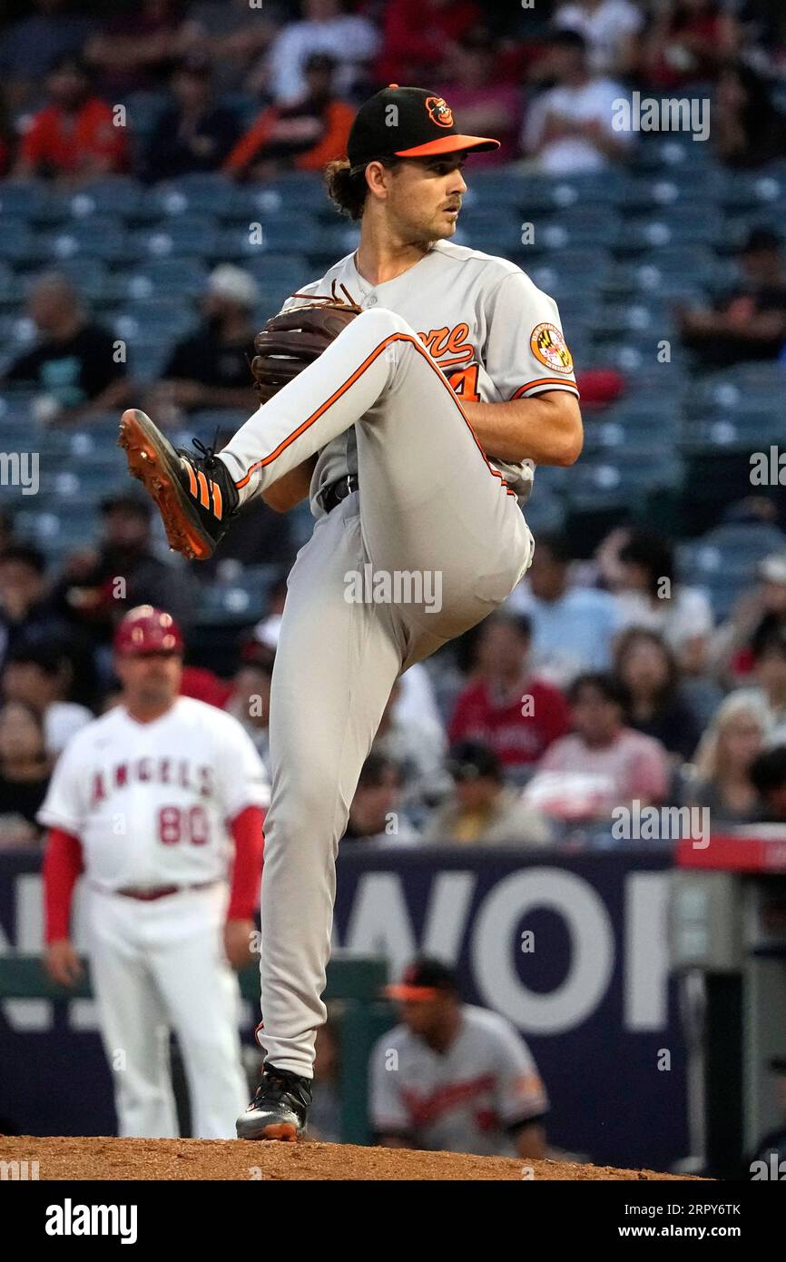 Baltimore Orioles starting pitcher Dean Kremer throws to the plate ...