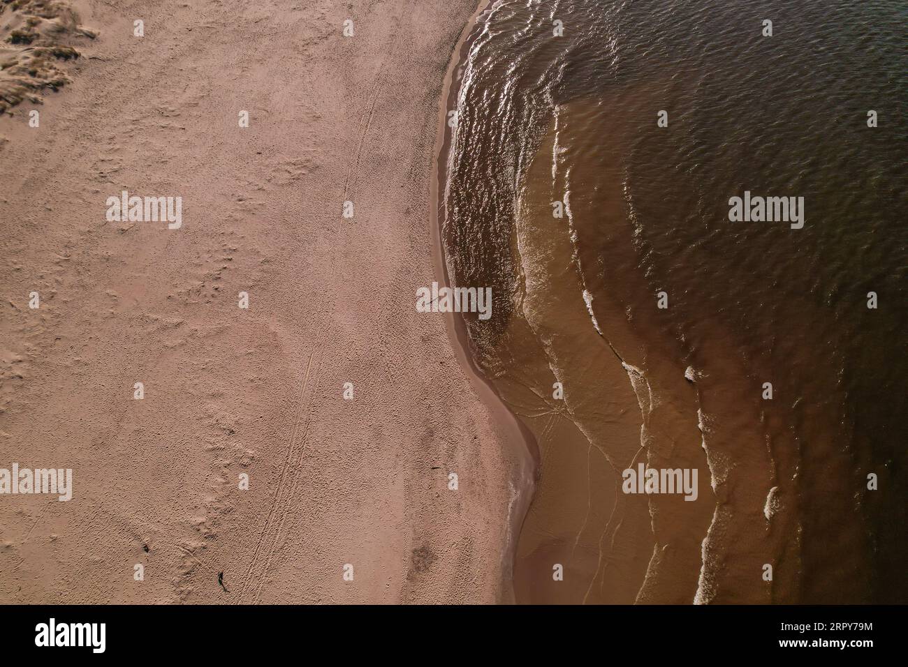 Drone aerial view of waves sea ocean coast. Beach and dunes dark calm ...