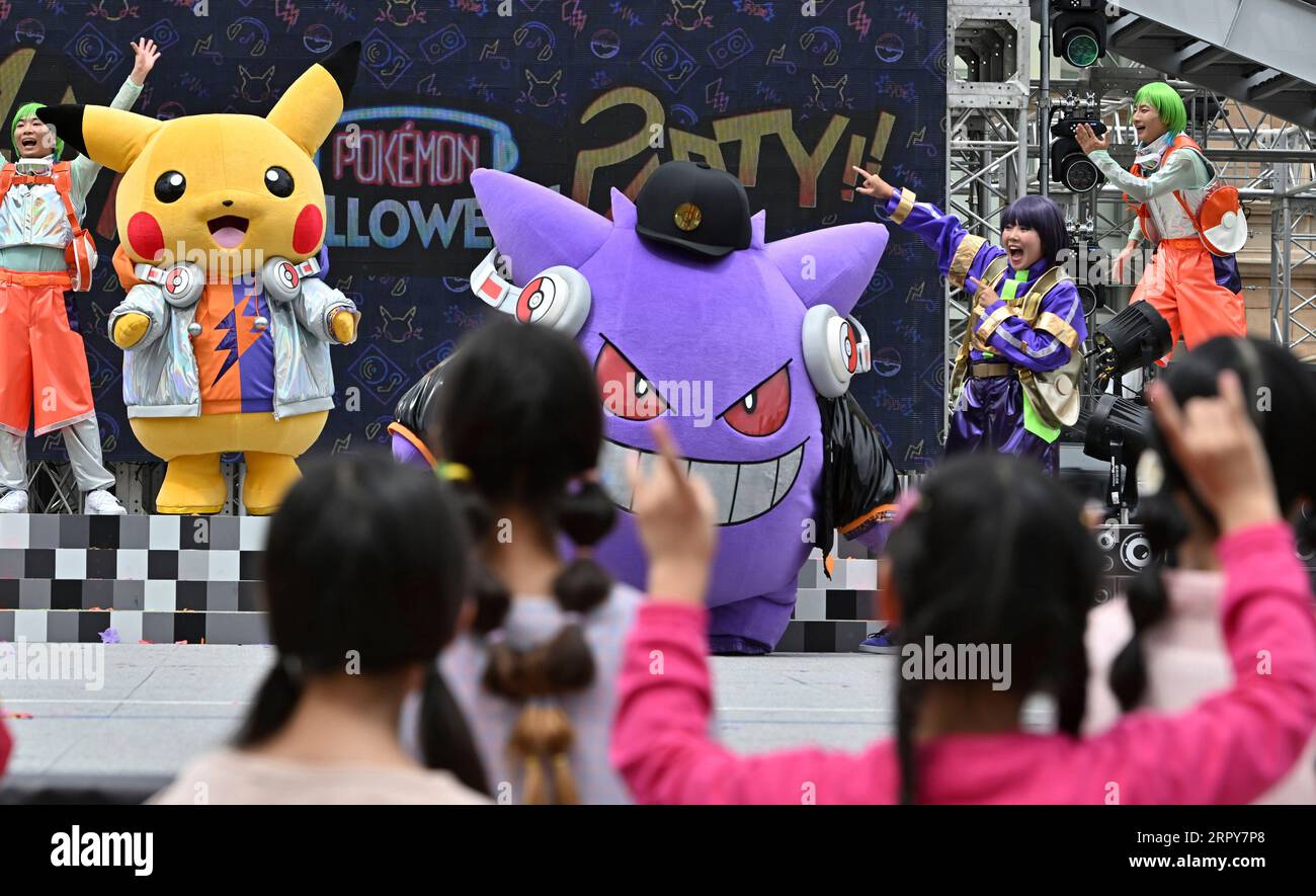DJ Pikachu and DJ Gengar are on a stage during the Halloween event at ...