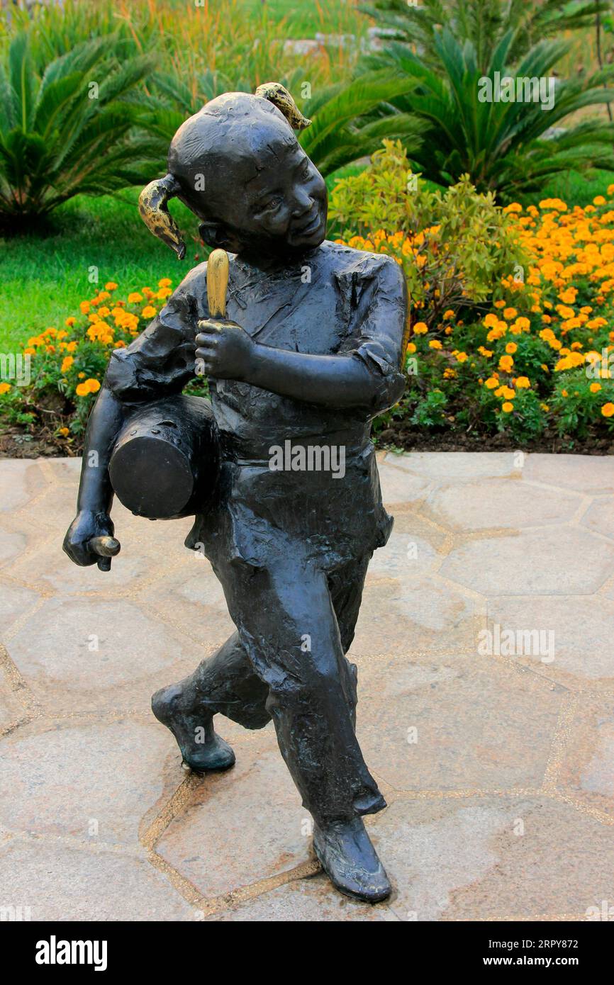 Children statue in a park, closeup of photo Stock Photo - Alamy