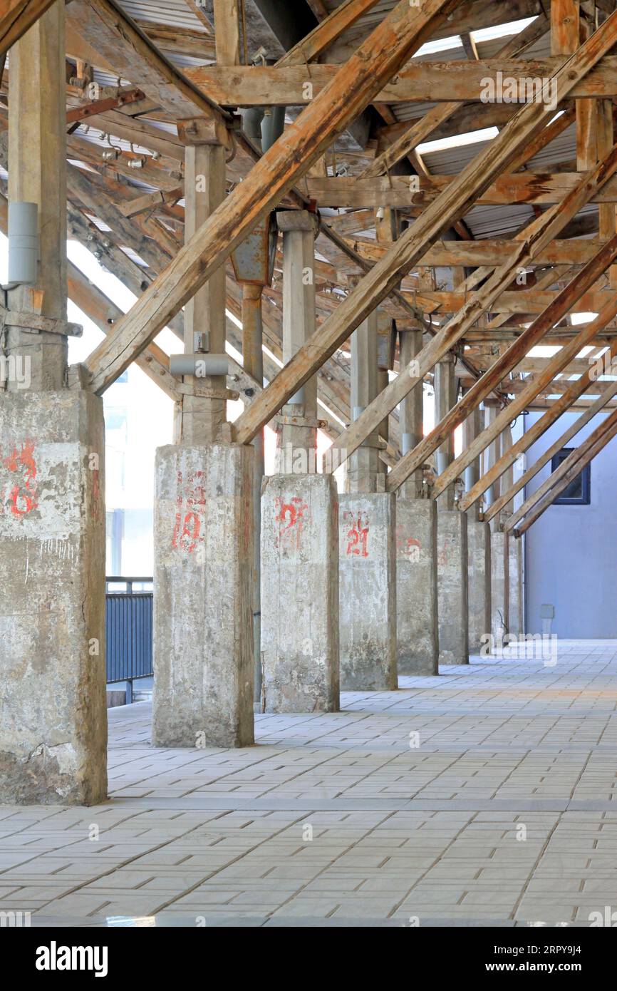 Cement column and wooden support, closeup of photo Stock Photo - Alamy