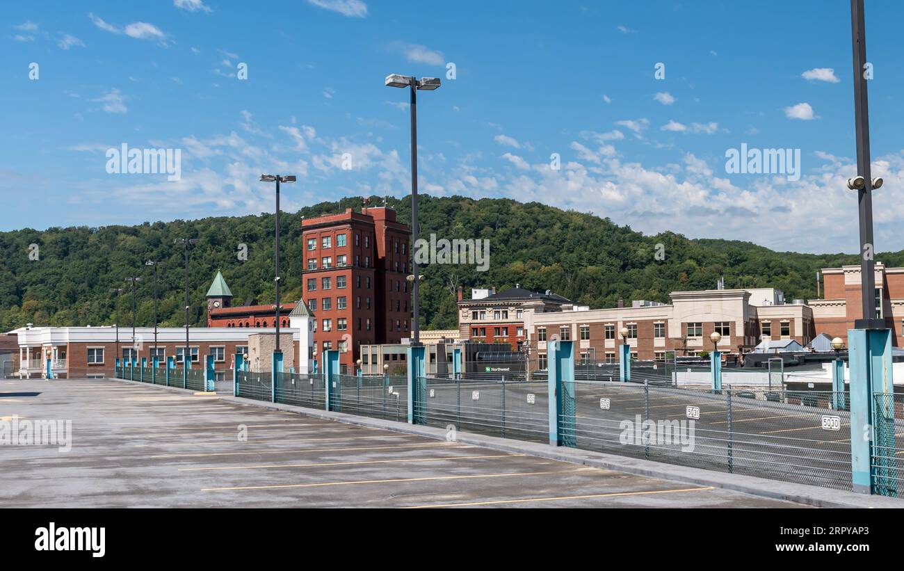 A partial view of downtown from the rooftop of a parking garage in ...