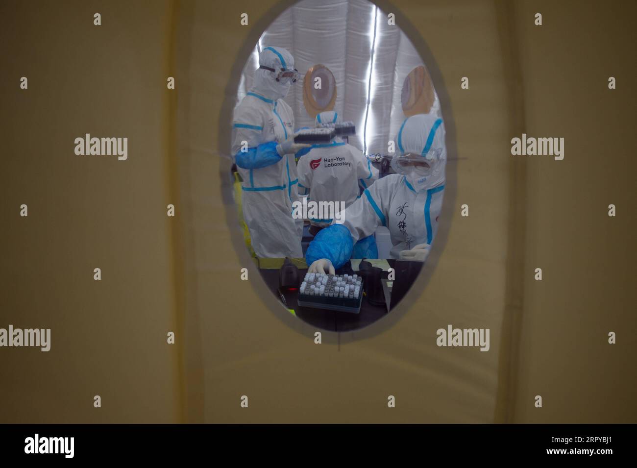 200624 -- BEIJING, June 24, 2020 -- Staff members work in an inflatable ...