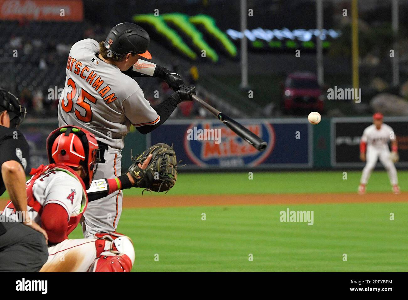 Baltimore Orioles' Adley Rutschman, right, hits an RBI single as Los ...
