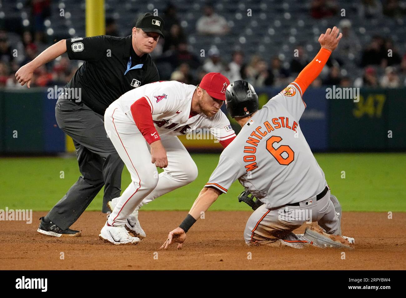 Baltimore Orioles' Ryan Mountcastle, right, is tagged out by Los ...