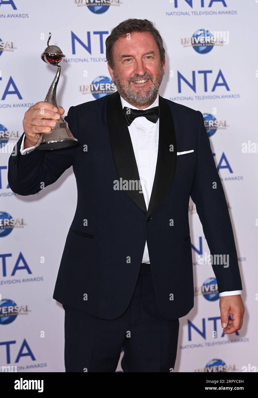 London, UK. September 5th, 2023. Lee Mack with the award for Quiz Game ...