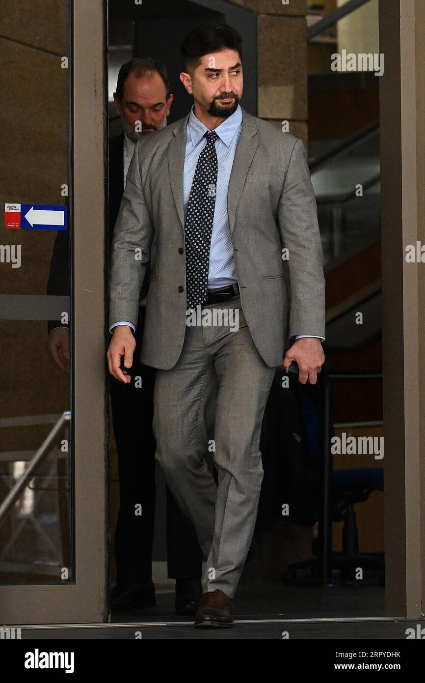 Melbourne, Australia. 06th Sep, 2023. Mohammad Reza Ahmadi (right) departs from the Melbourne ...