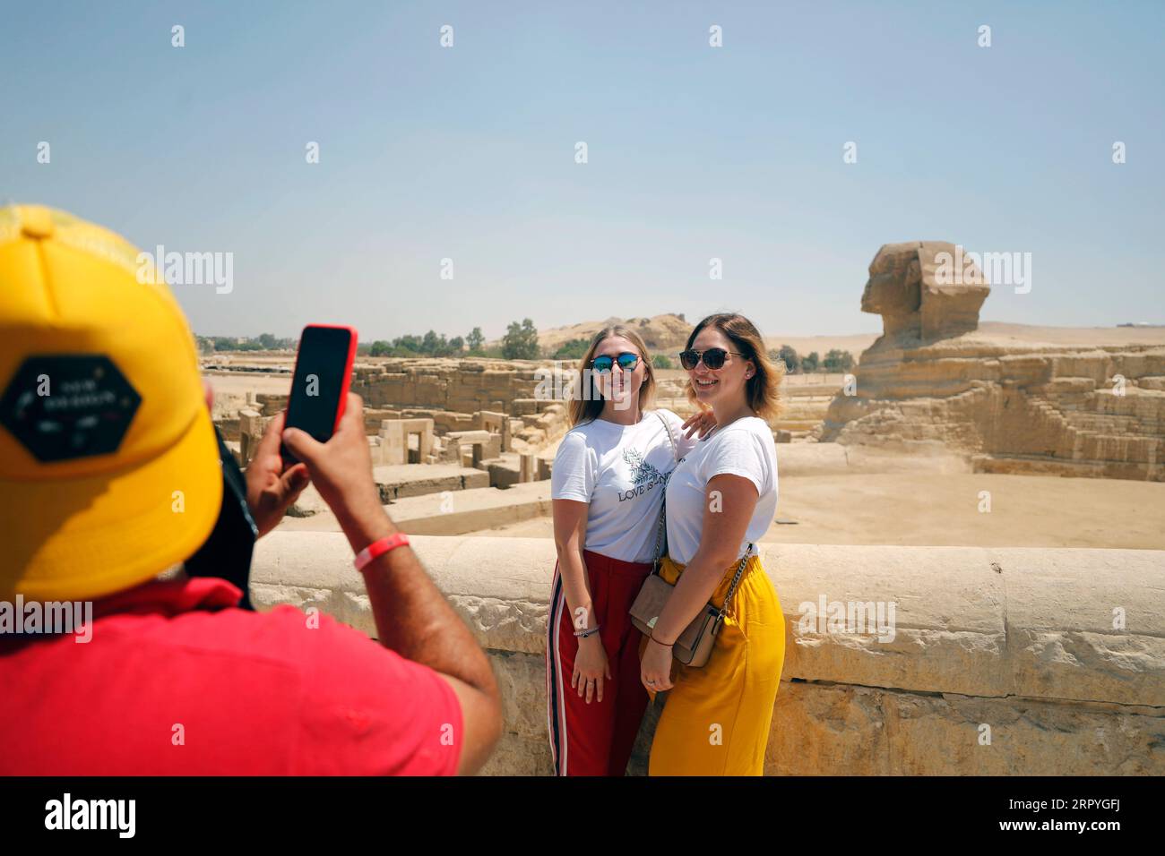 200701 -- GIZA EGYPT, July 1, 2020 Xinhua -- Tourists pose for photos ...