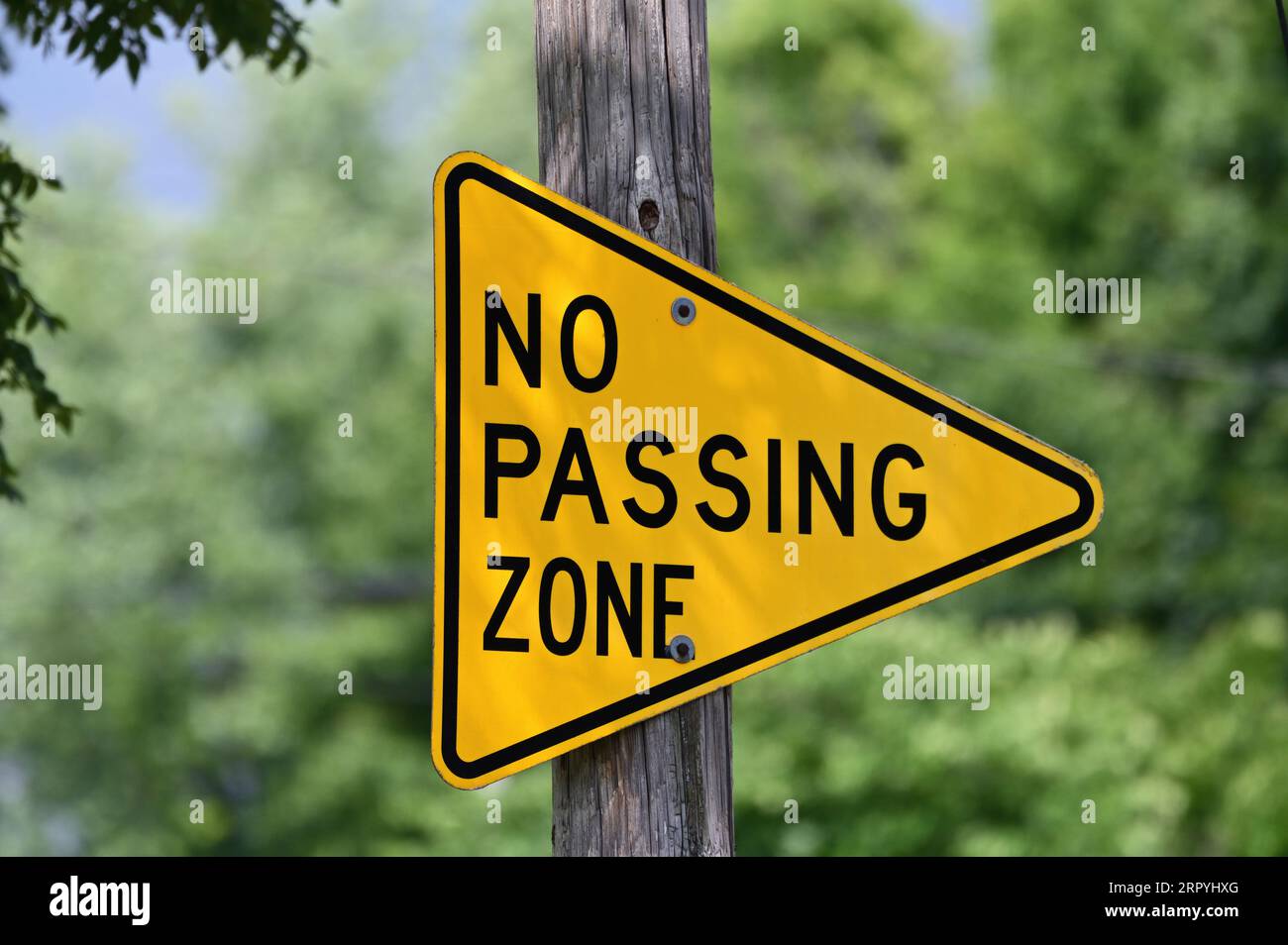 Maple Park, Illinois, USA. A no passing sign attached to an old ...