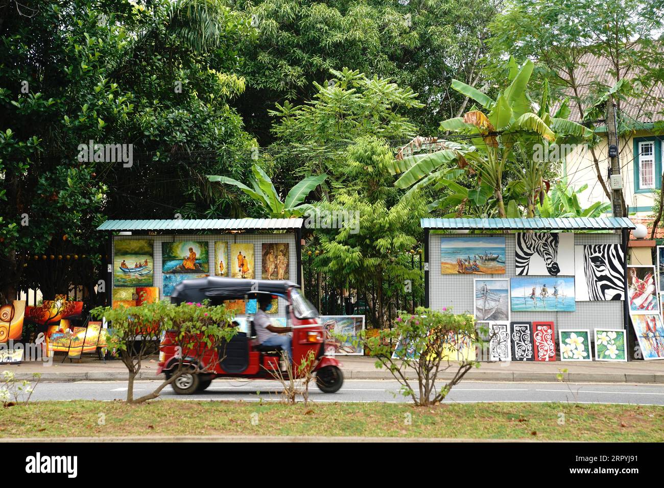 200704 -- COLOMBO, July 4, 2020 -- An auto rickshaw runs along Green ...