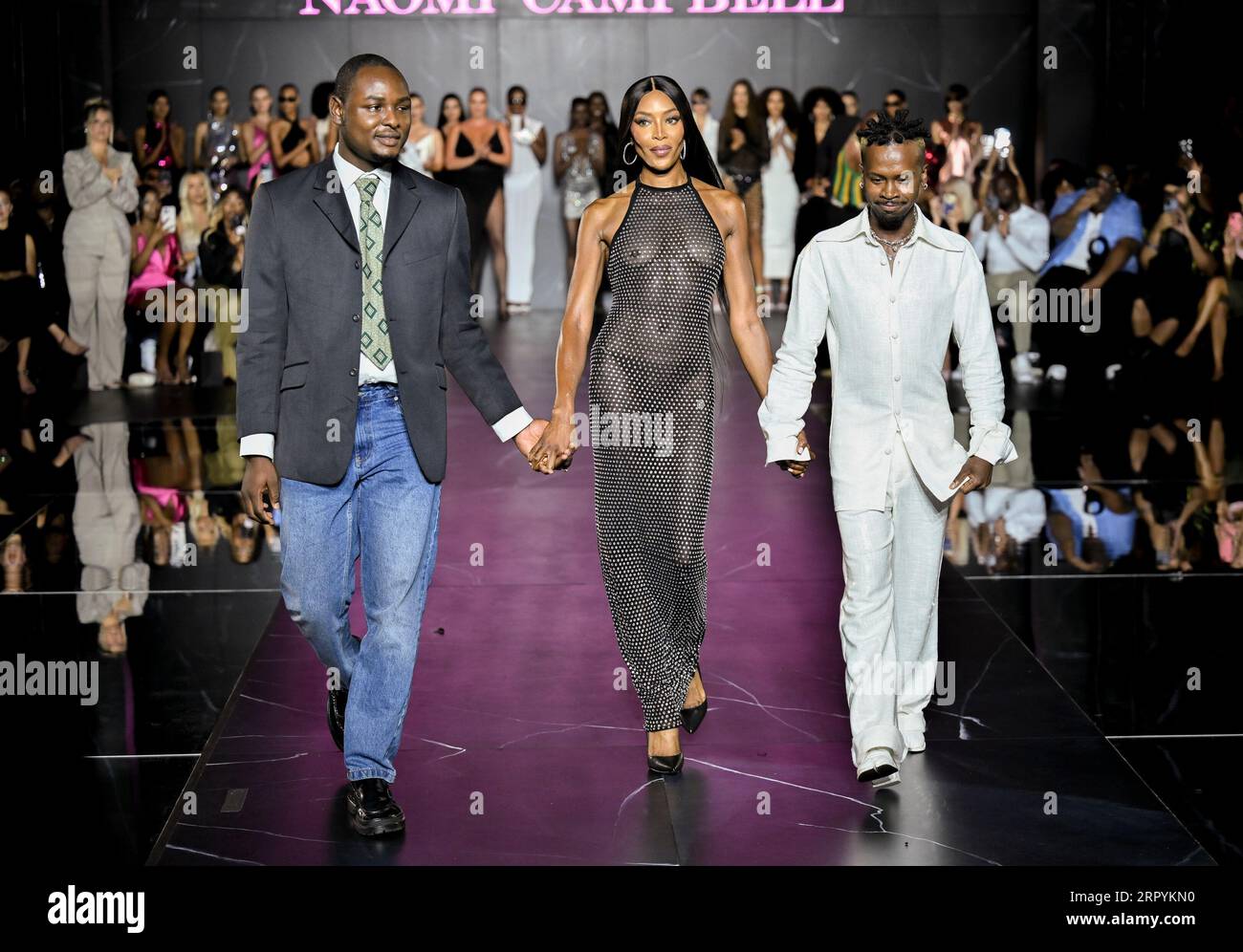 EDS NOTE: NUDITY - Designers Victor Anate, left, Naomi Campbell and ...